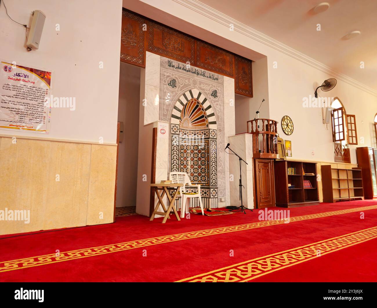 Cairo, Egypt, September 4 2024: A mosque Mihrab and pulpit, a niche in ...