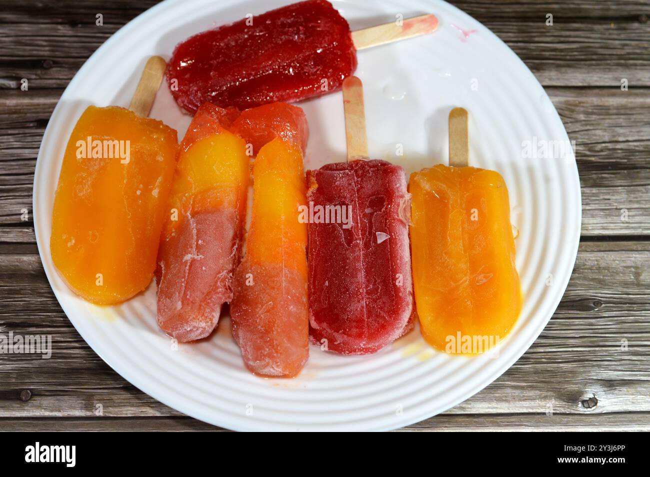 Ice Cream bars made of real fruits of mango and mixed berries, an ice ...