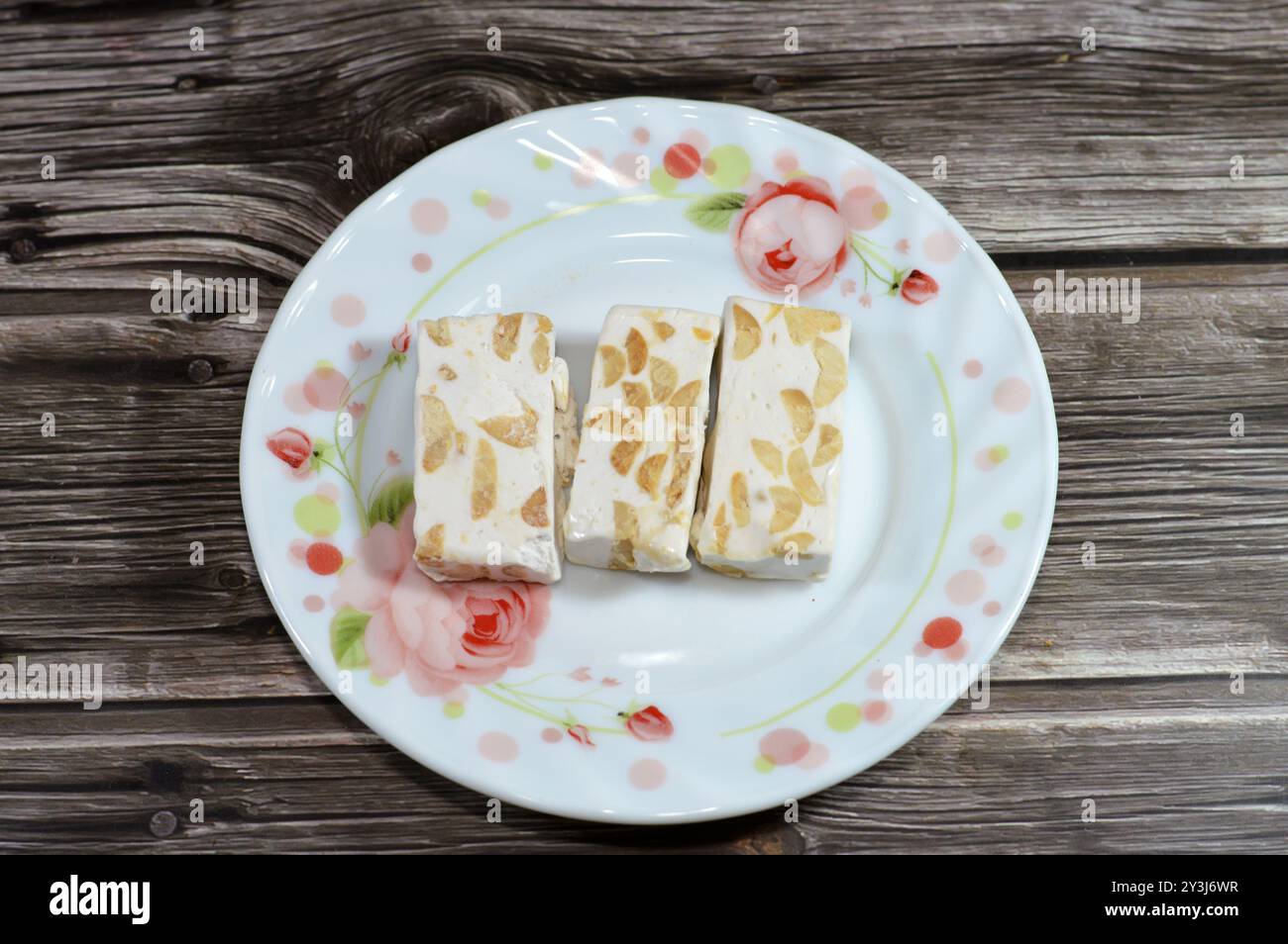 Pieces of Arabic sweet delicious Noga with peanuts,Egyptian cultural ...