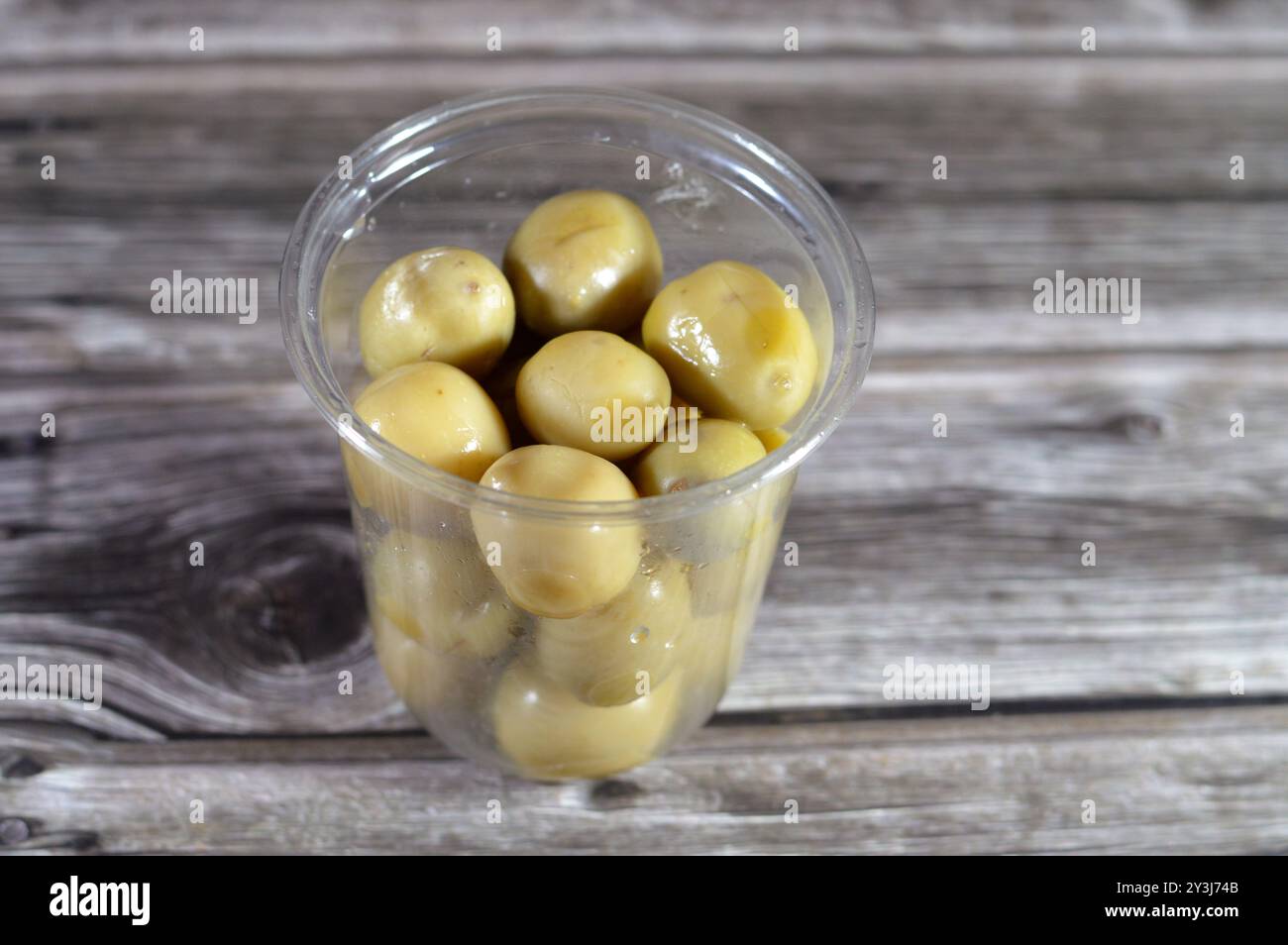 Pickled green olives, serves as an ideal side dish in a variety of ...