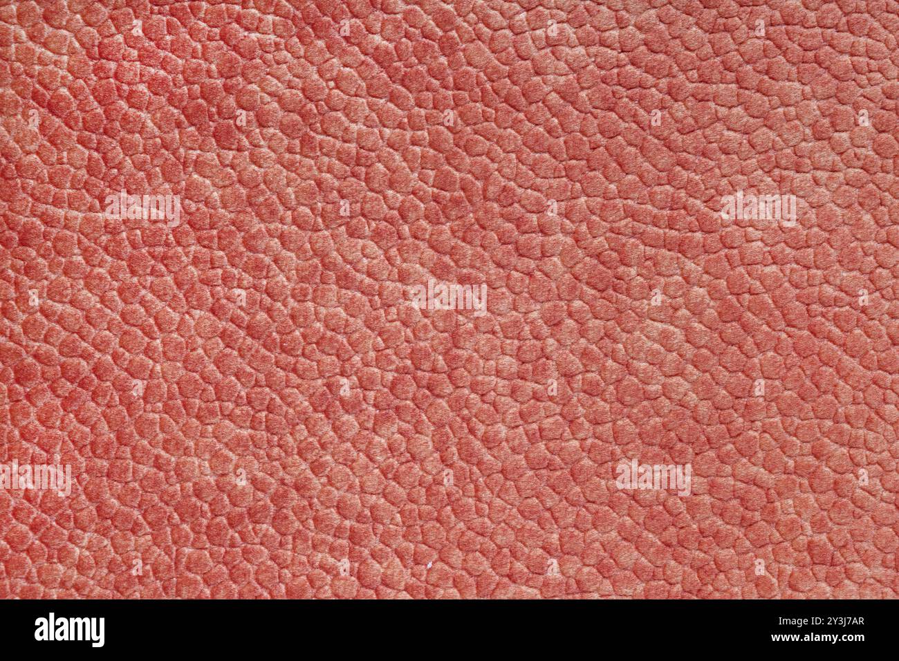 Velours red fabric with with embossed pattern like leather structure ...