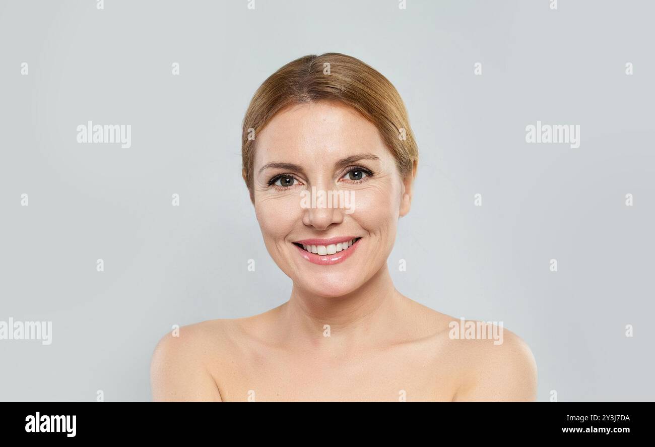 Adult woman with smooth healthy facial skin. Beautiful aging mature ...