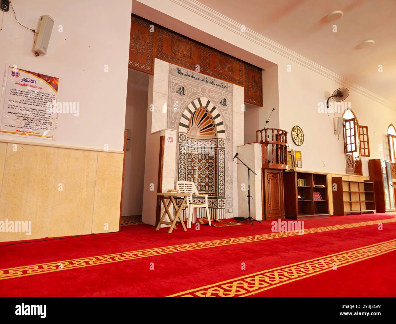Cairo, Egypt, September 4 2024: A mosque Mihrab and pulpit, a niche in ...