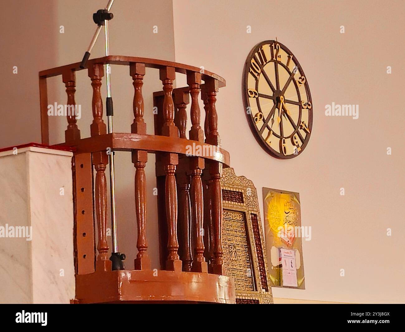 Cairo, Egypt, September 4 2024: Mosque pulpit and a wall mounted clock ...