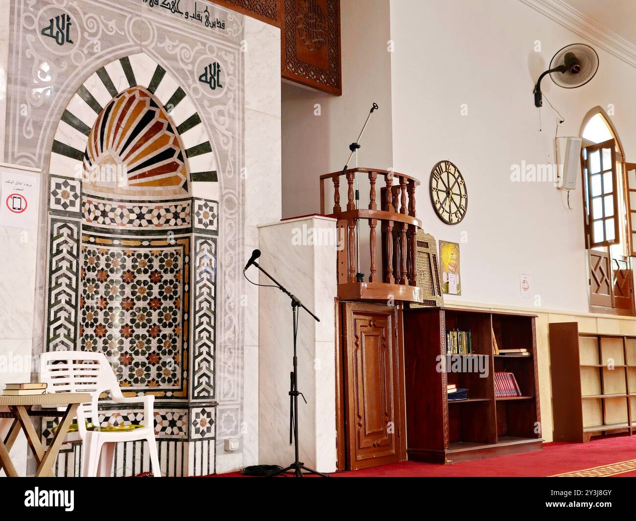 Cairo, Egypt, September 4 2024: A mosque Mihrab and pulpit, a niche in ...