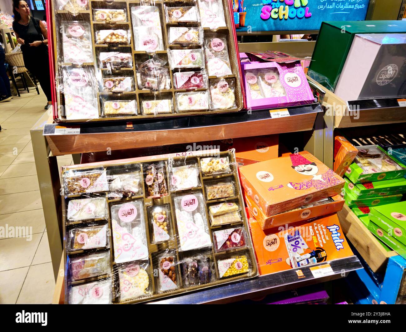 Cairo, Egypt, September 7 2024: Assorted Eastern candies, taffy, peanuts, sesame, chocolate ...