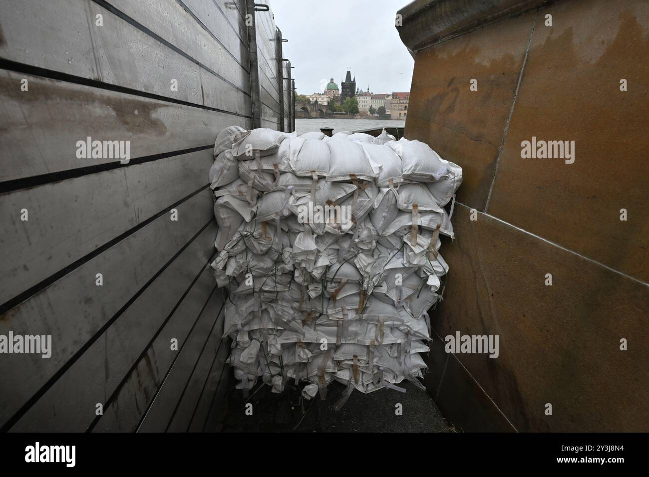 Prague, Czech Republic. 14th Sep, 2024. Workers build flood barriers ...