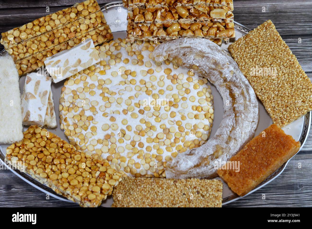 collection of Eastern candy chickpeas, peanuts, sesame, walnuts taffy ...