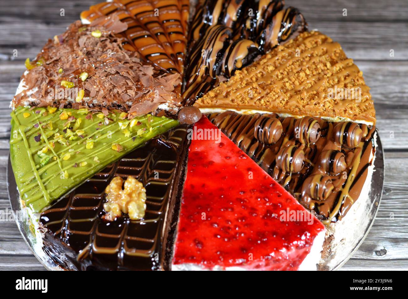Spongy cake pieces with assorted toppings and fillings with whipped ...