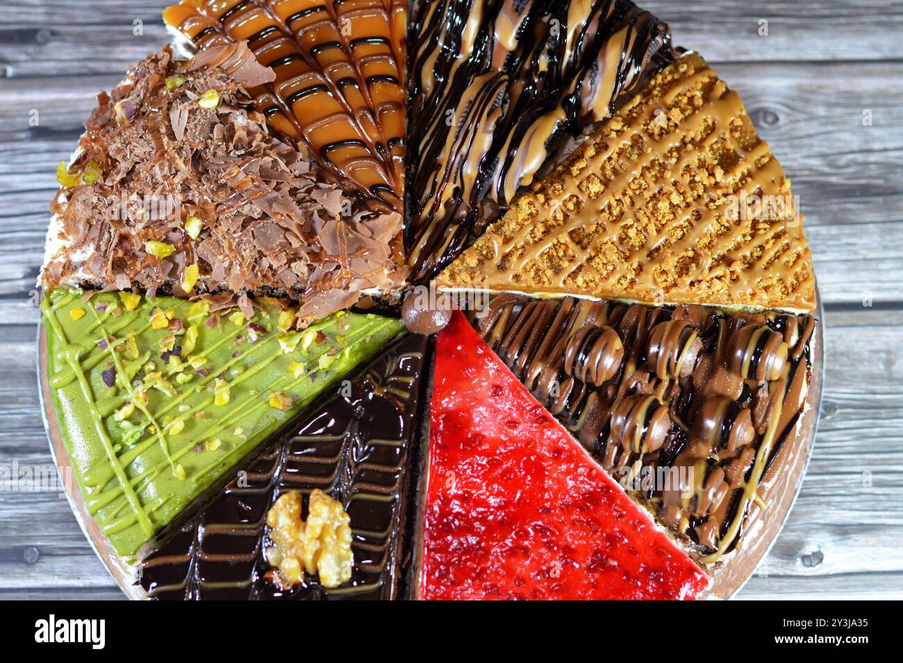 Spongy cake pieces with assorted toppings and fillings with whipped ...