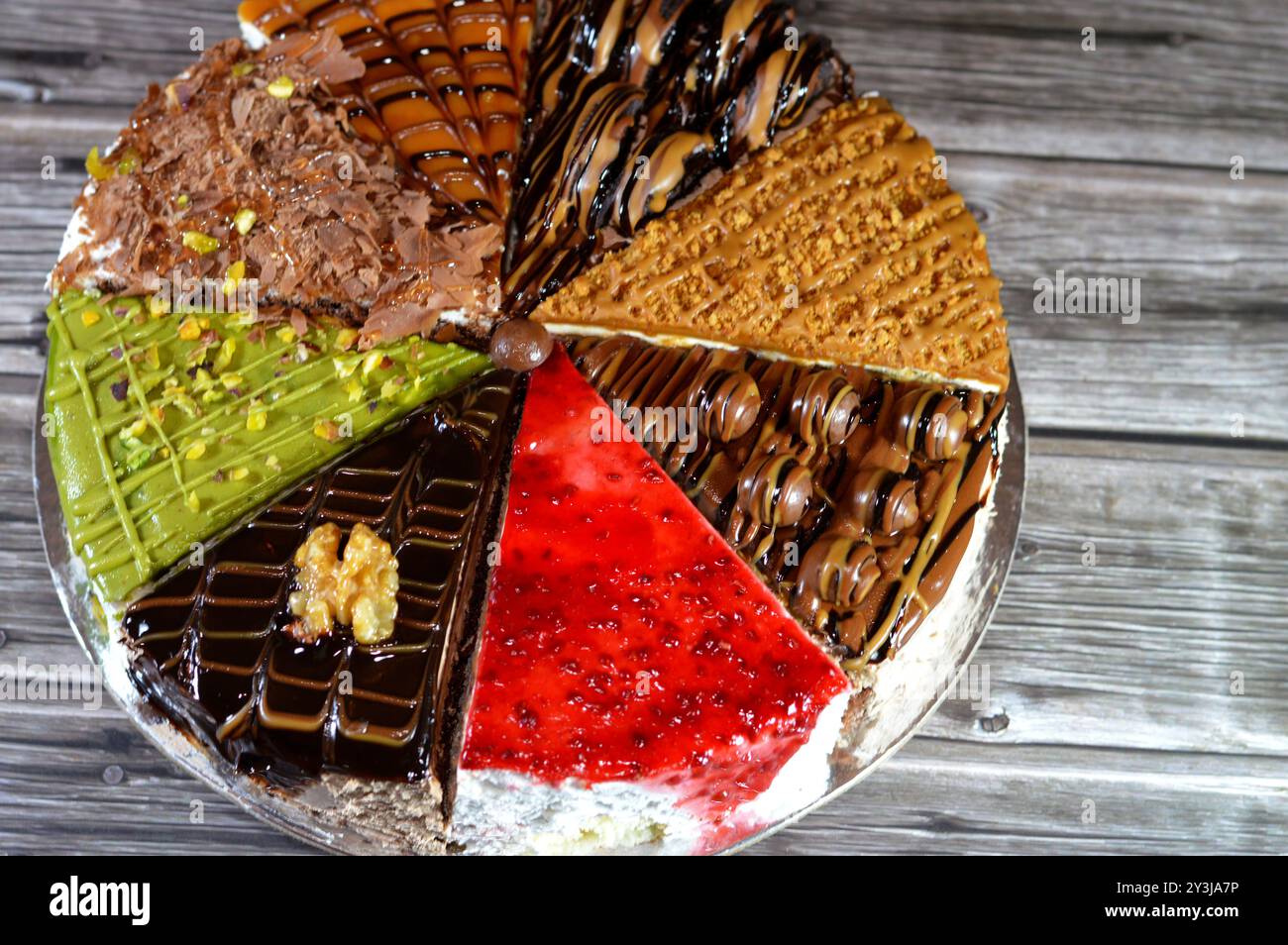 Spongy cake pieces with assorted toppings and fillings with whipped ...