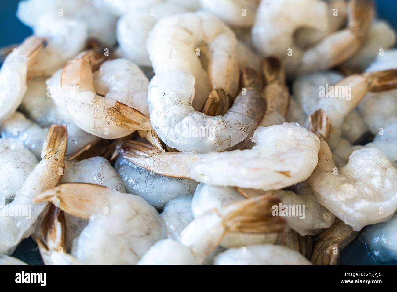 Frozen, raw shrimp. Texture: King Prawns background. Seafood on the ...