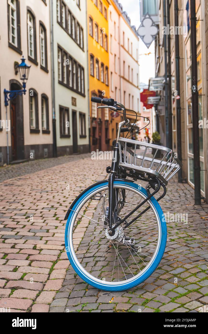 Bicycle with basket on an old narrow European street Stock Photo - Alamy