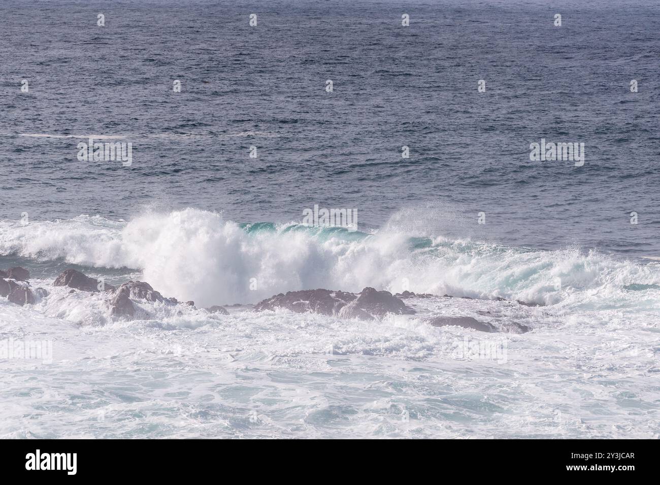 Spectacularly big waves from the pacific ocean smash into the ...