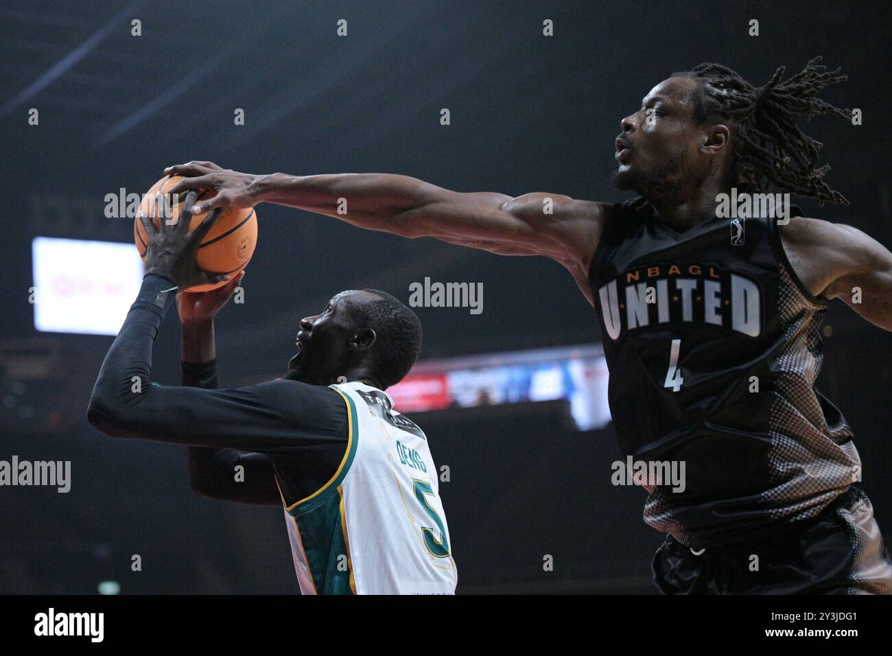 Singapore. 14th Sep, 2024. Deonte Burton (R) of NBA G League United ...