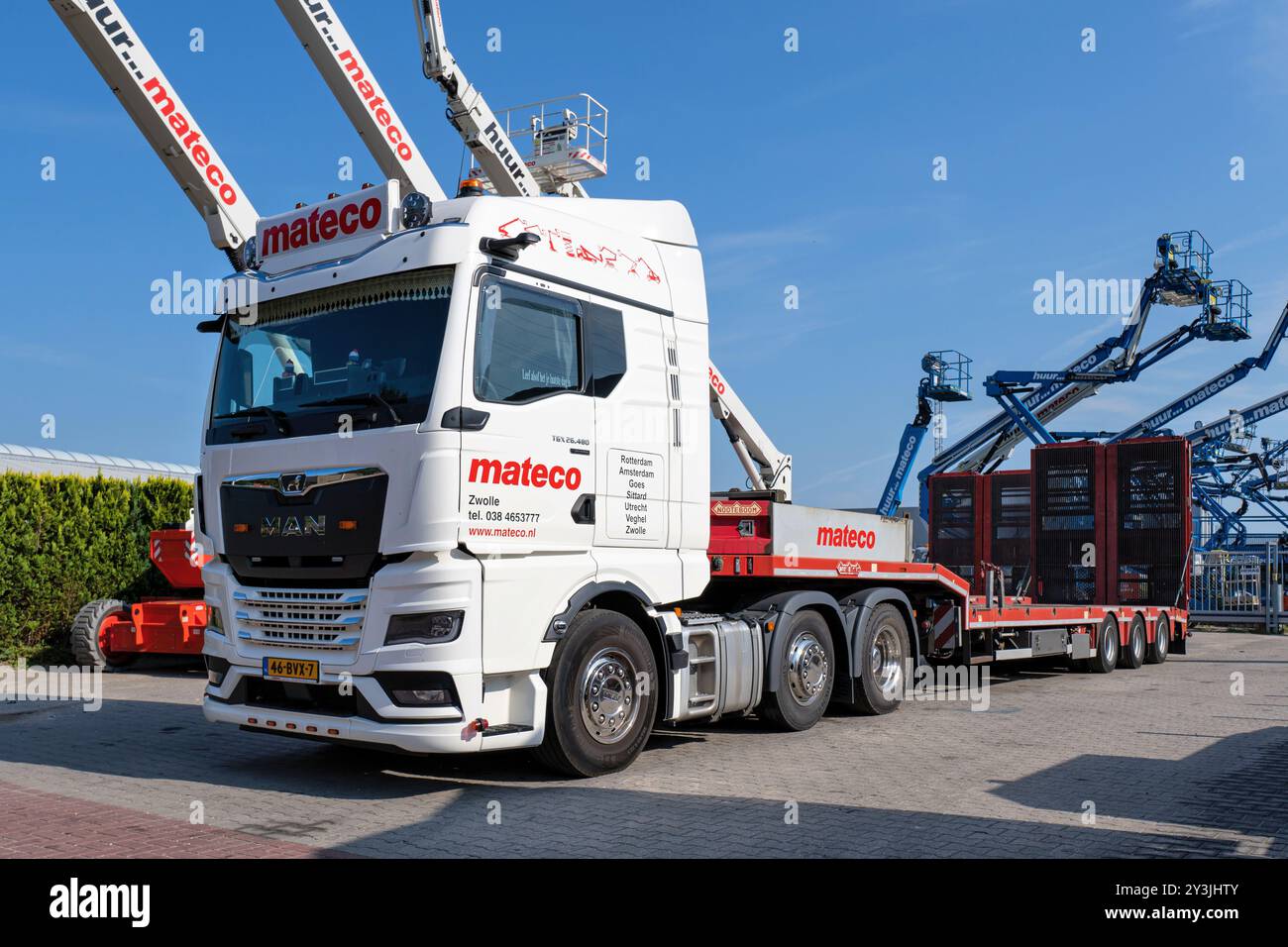 Mateco MAN TGX flatbed truck Stock Photo - Alamy