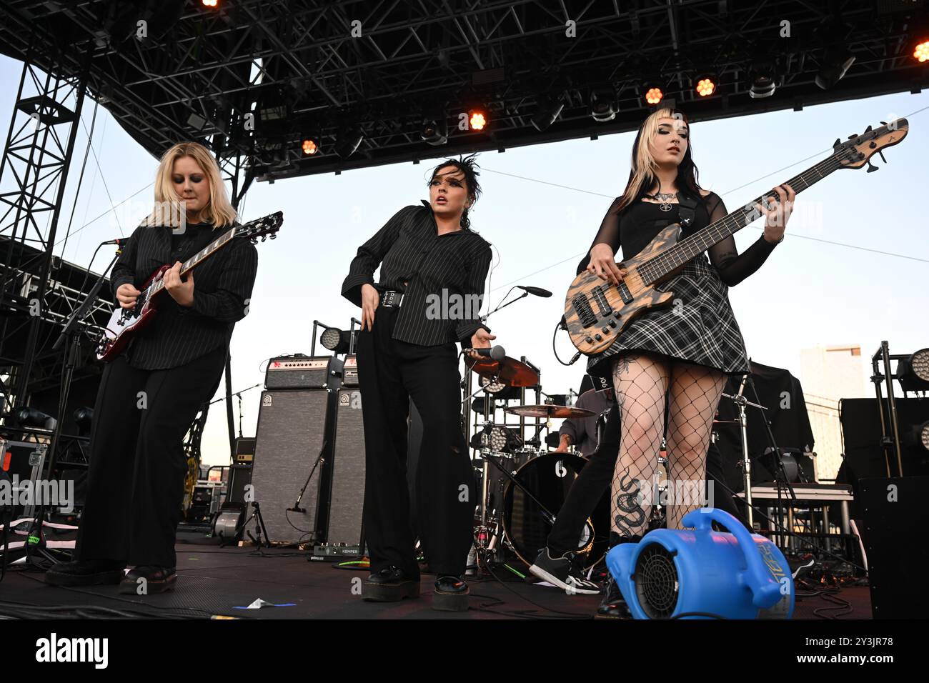 (L-R) Amy Woodall, Holly Minto and Liv May of Crawlers perform at Pier 17 Rooftop on September ...