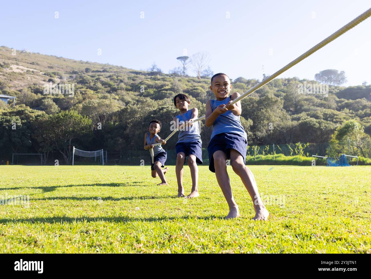 Children playing tug of war hi-res stock photography and images - Alamy