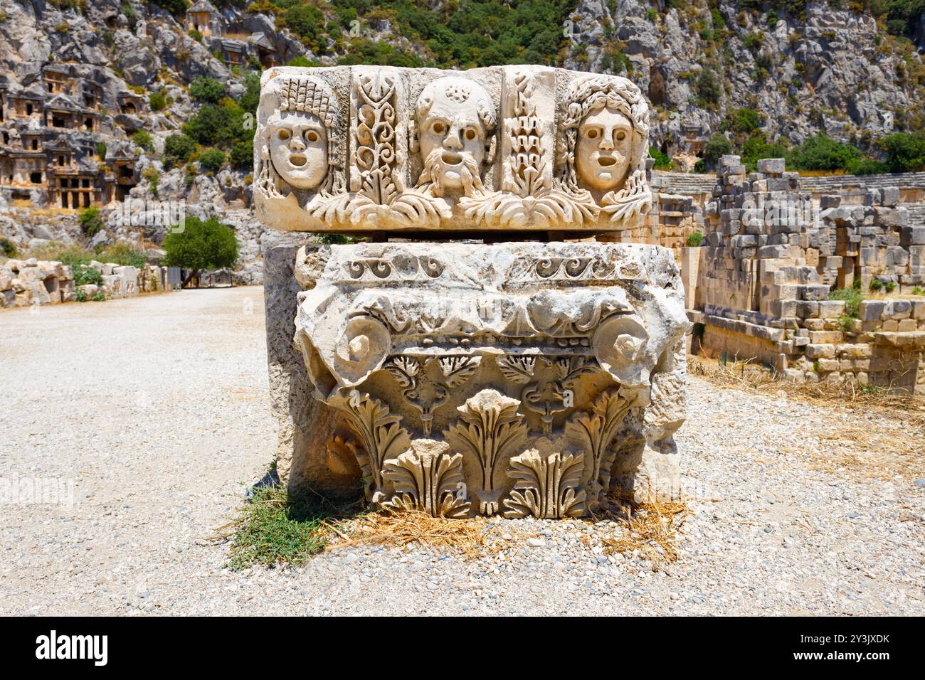 Carved stone faces at the Myra ancient city ruins. Myra is located in ...