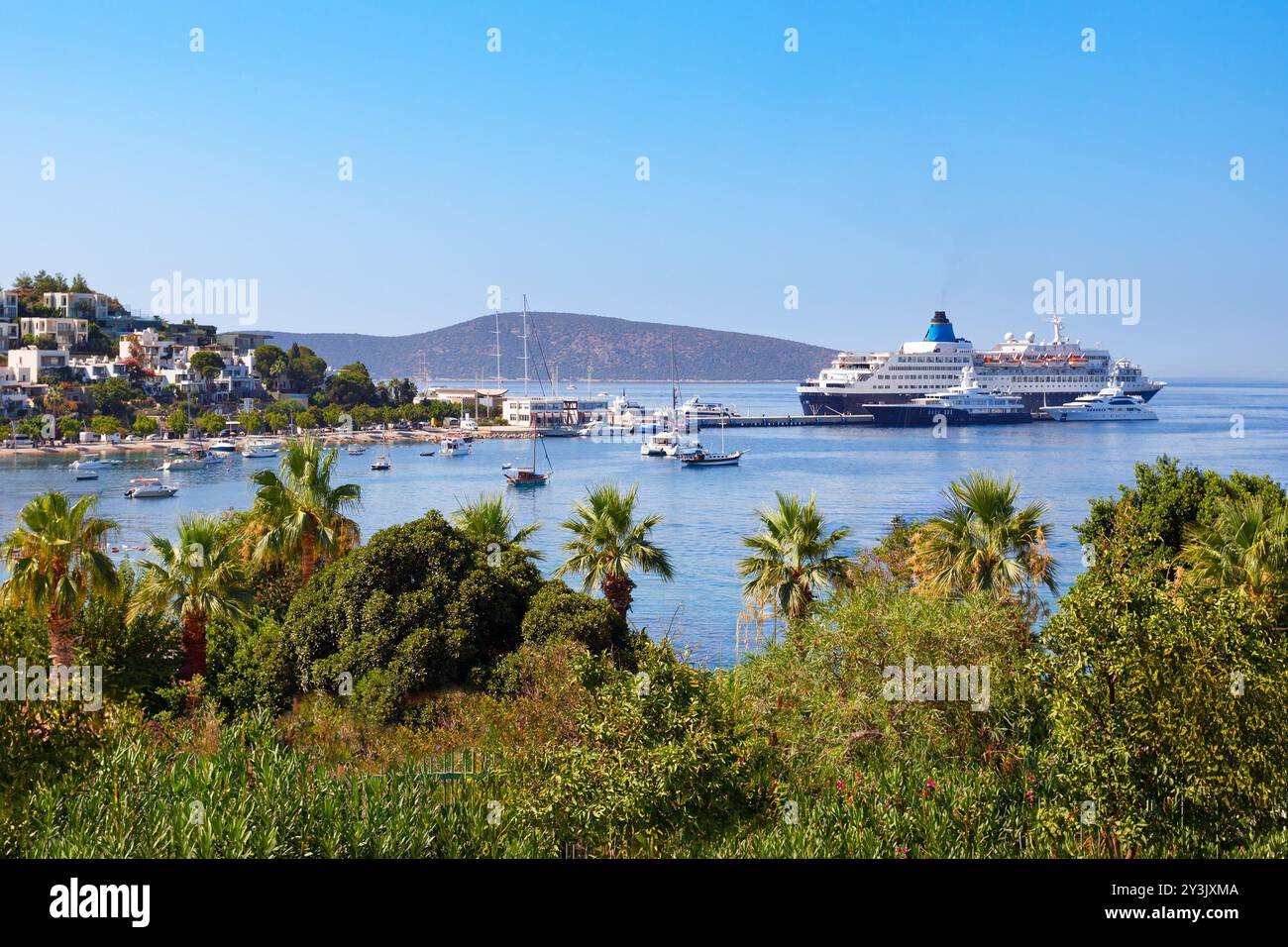 Big cruise ship in Bodrum marina aerial panoramic view. Bodrum is a ...
