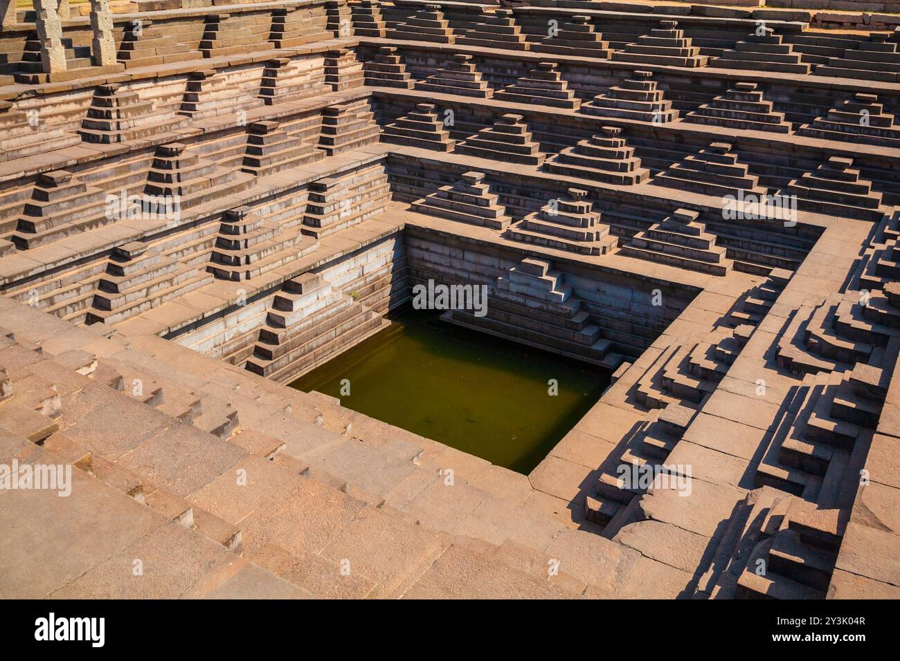 A stepped square water tank at Hampi, the centre of the Hindu ...