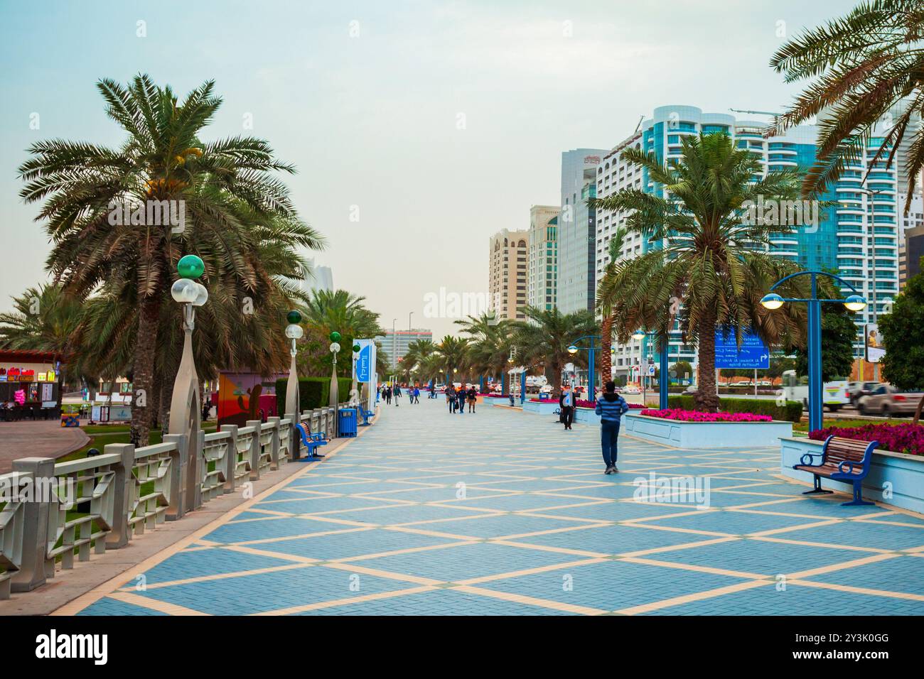Abu Dhabi beach promenade at sunset. Abu Dhabi is the capital and the second largest city of the ...