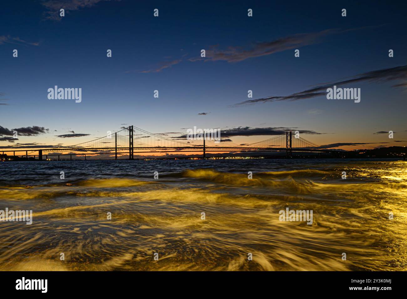 A View Of The Forth Rail Bridge Against A Sunset Sky With The ...