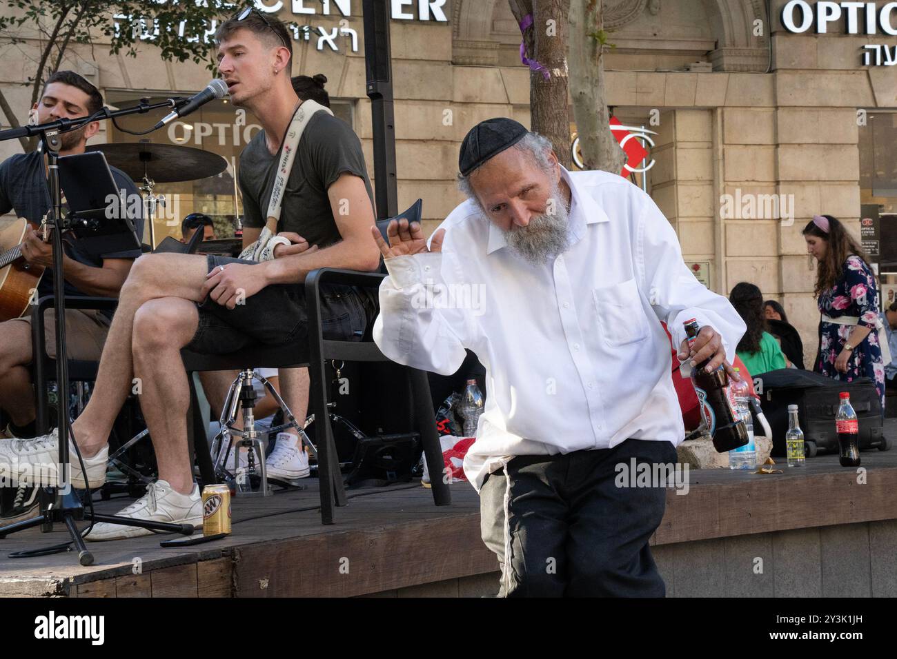 Jerusalem, Israel - July 18th, 2024: A Jewish orthodox man dancing to ...