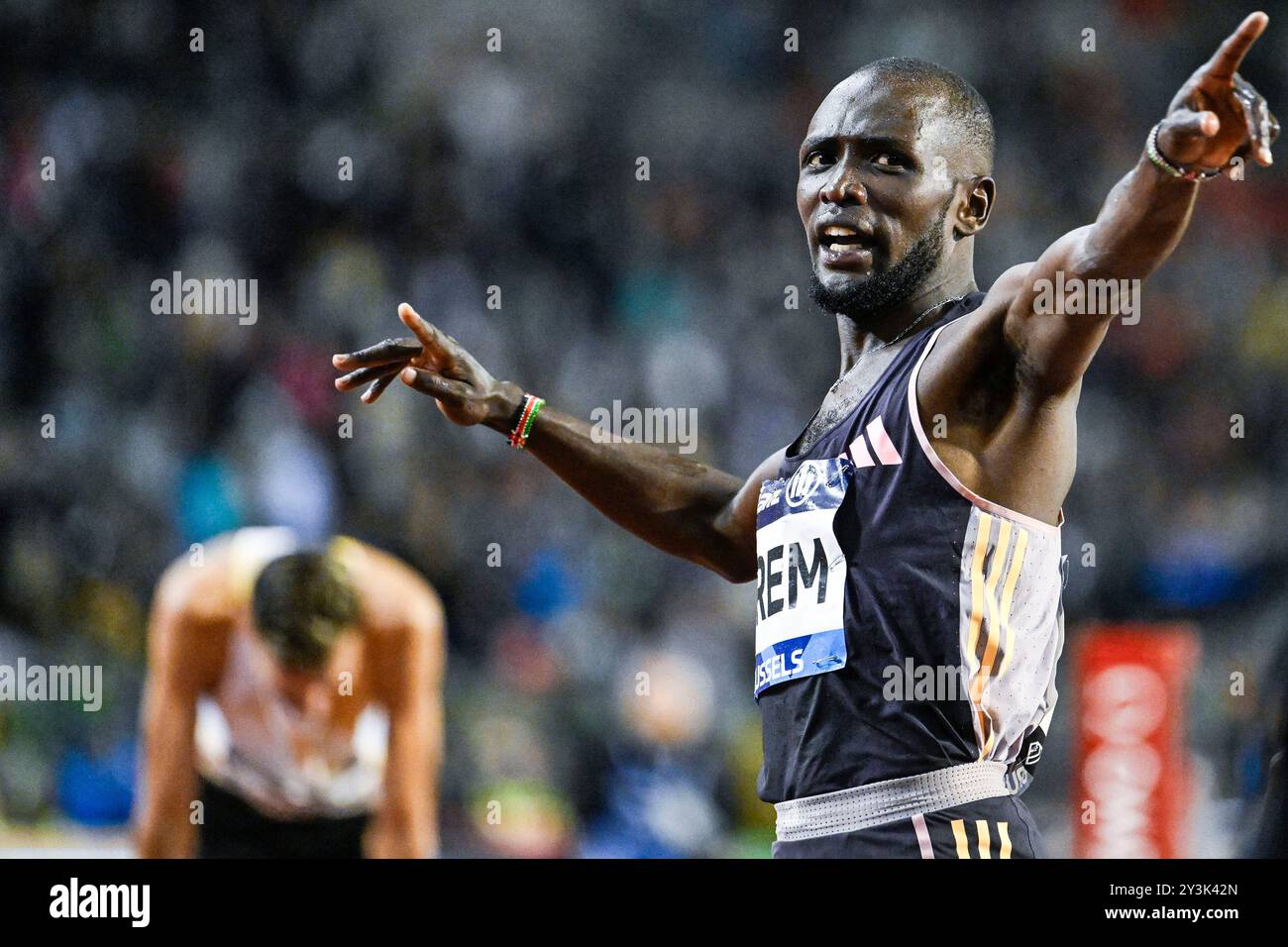 Kenya's Amos Serem celebrates as he crosses the finish line to win the ...