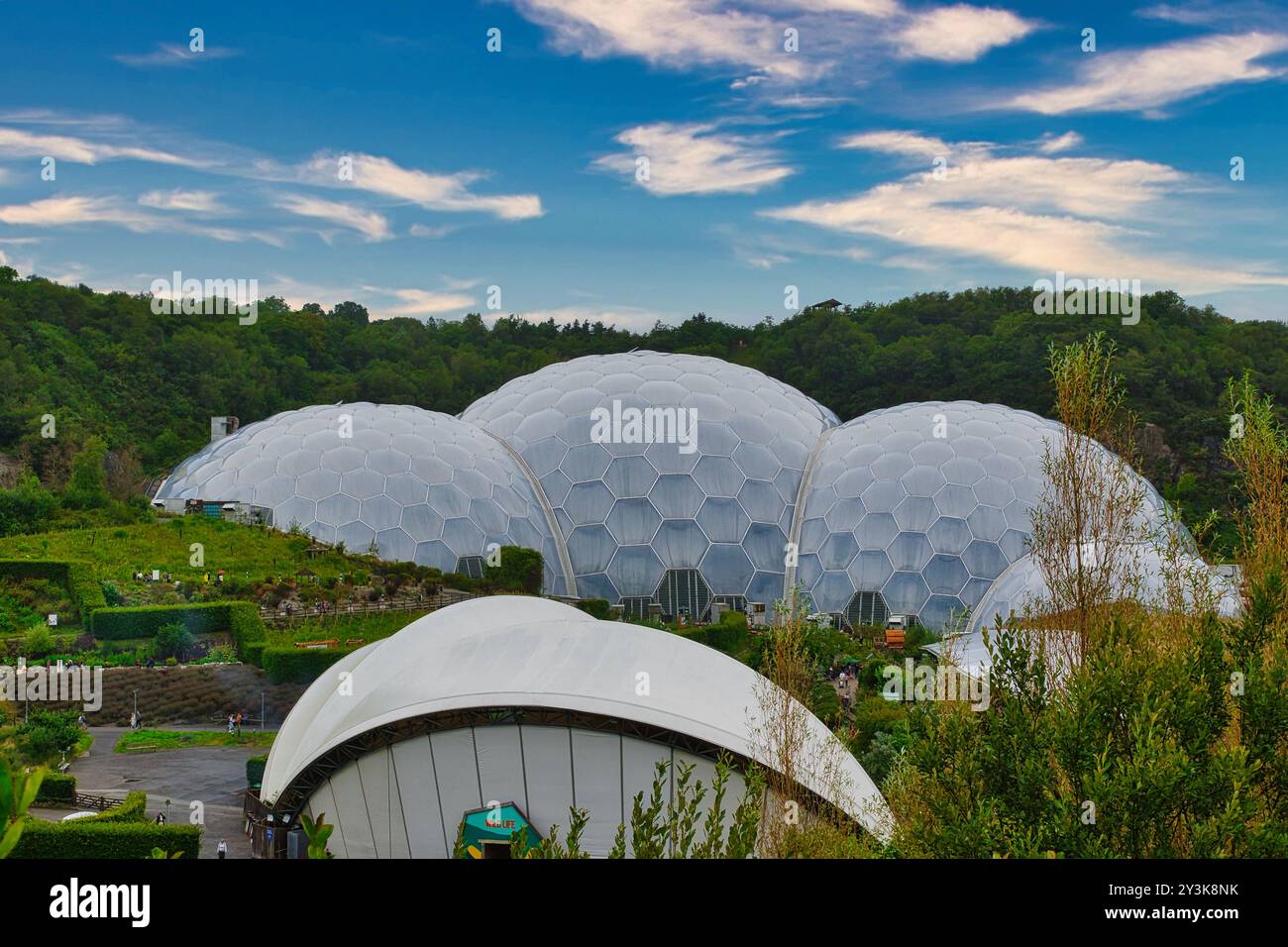 A scenic view of the Eden Project, featuring large geodesic domes ...