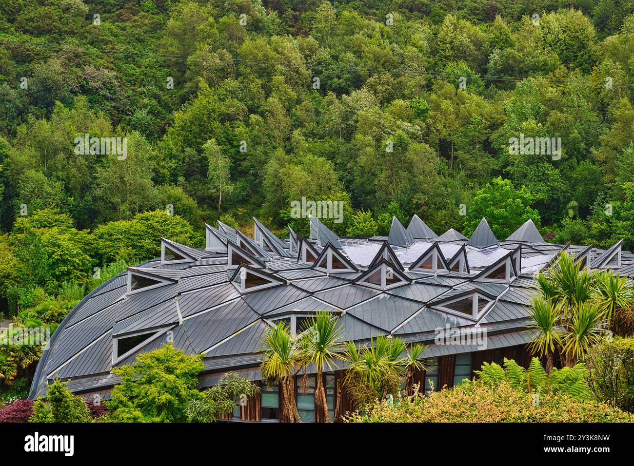 A modern architectural building with a unique spiky roof design ...