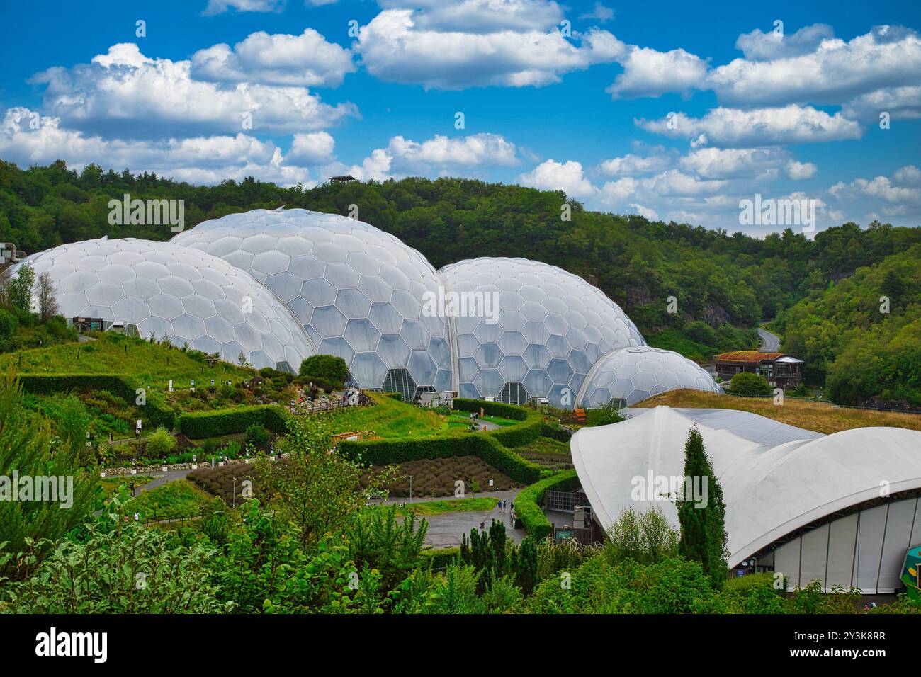 A scenic view of the Eden Project, featuring large geodesic domes ...