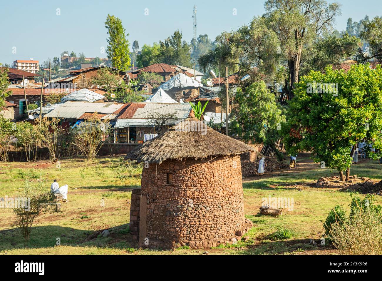 Traditional ethiopian stone round house with thatch and local village ...