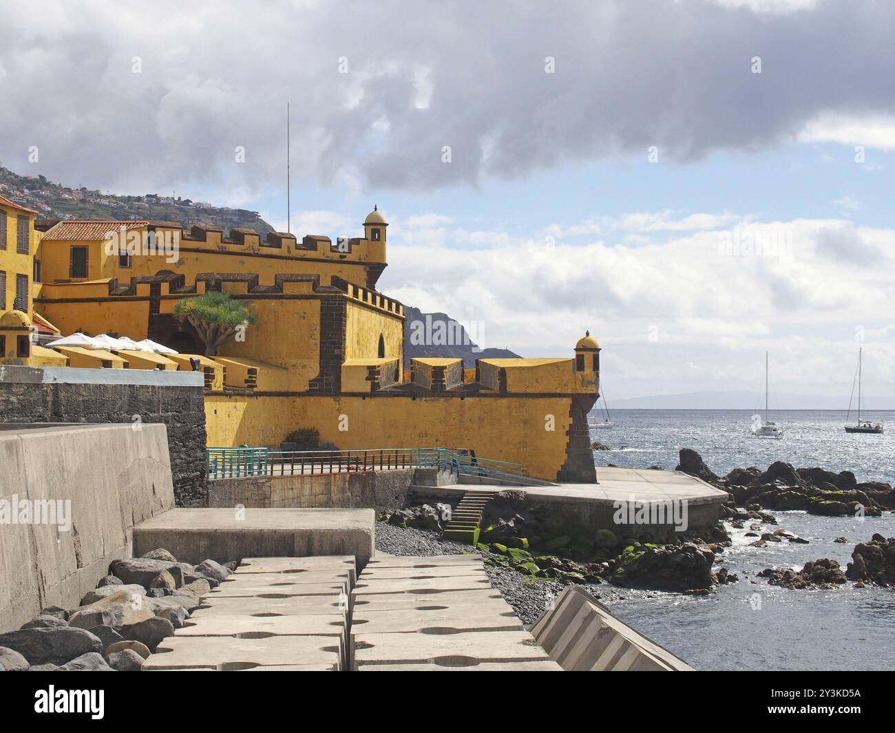 View of the 17th century yellow fort Fort of Sao Tiago in funchal ...