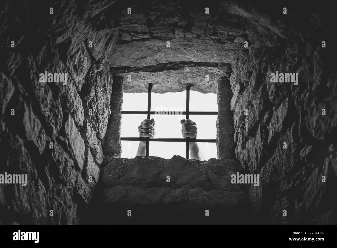 Freedom concept image, in monochrome settings, with a man holding the ...