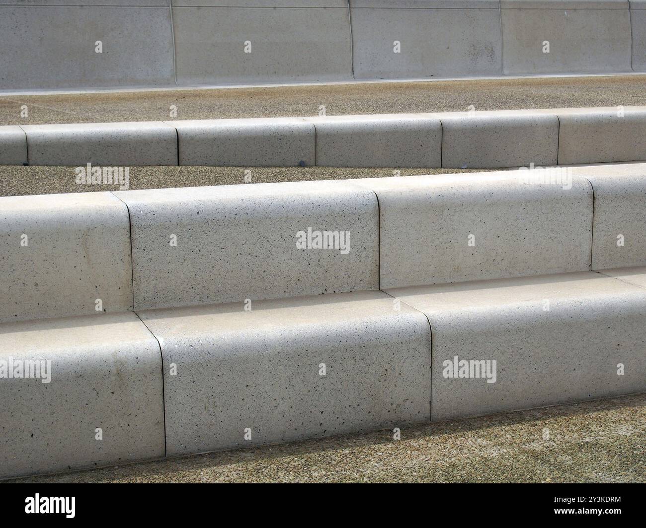 Modern angled outdoor steps with rounded corners int textured grey and ...