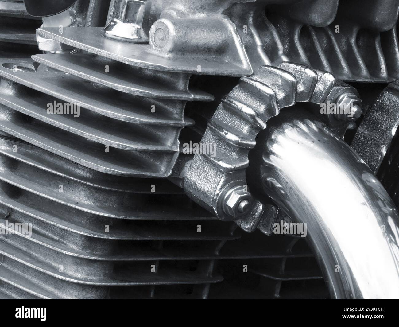 The engine block of an old vintage motorcycle with black frame and ...