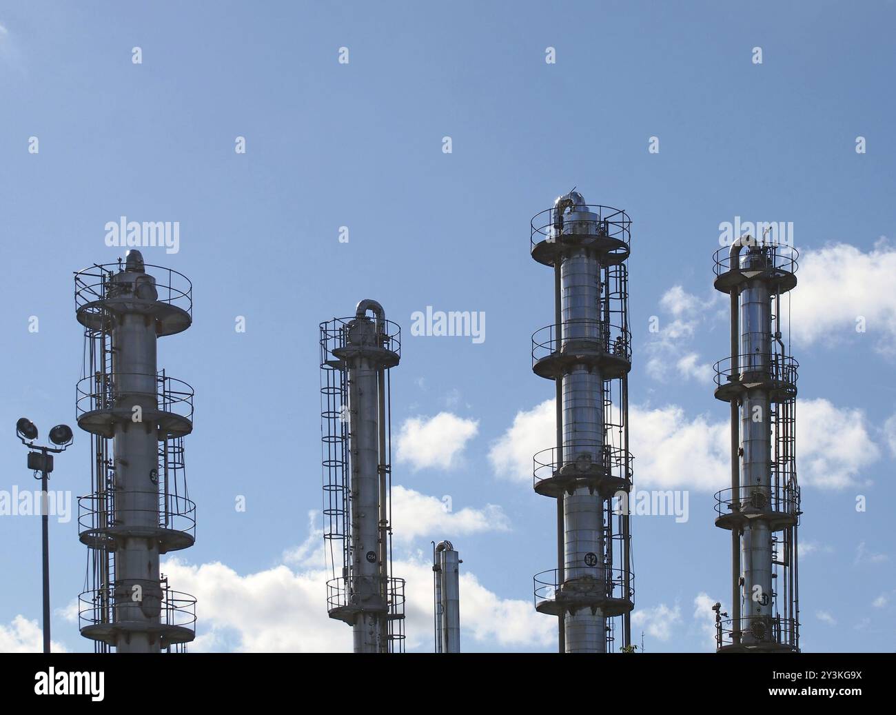Tall steel fractionation or cooling towers at a large industrial ...