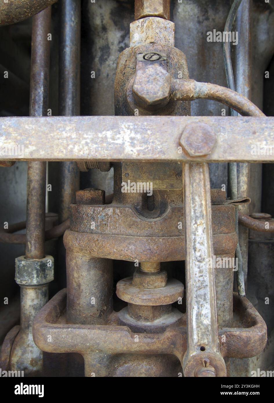 Detail of the cylinder and pipes in an old rusted decaying abandoned ...