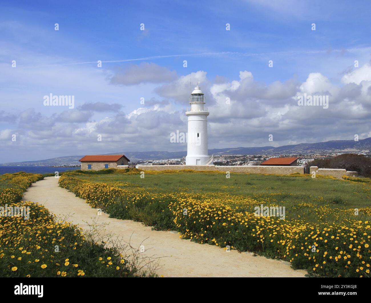 The old lighthouse in paphos cyprus surrounded by historic buildings ...