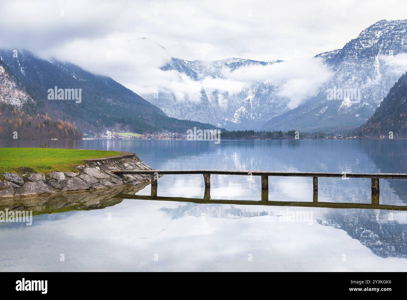 Trip idea theme image with the Hallstatter lake, a small bridge that ...