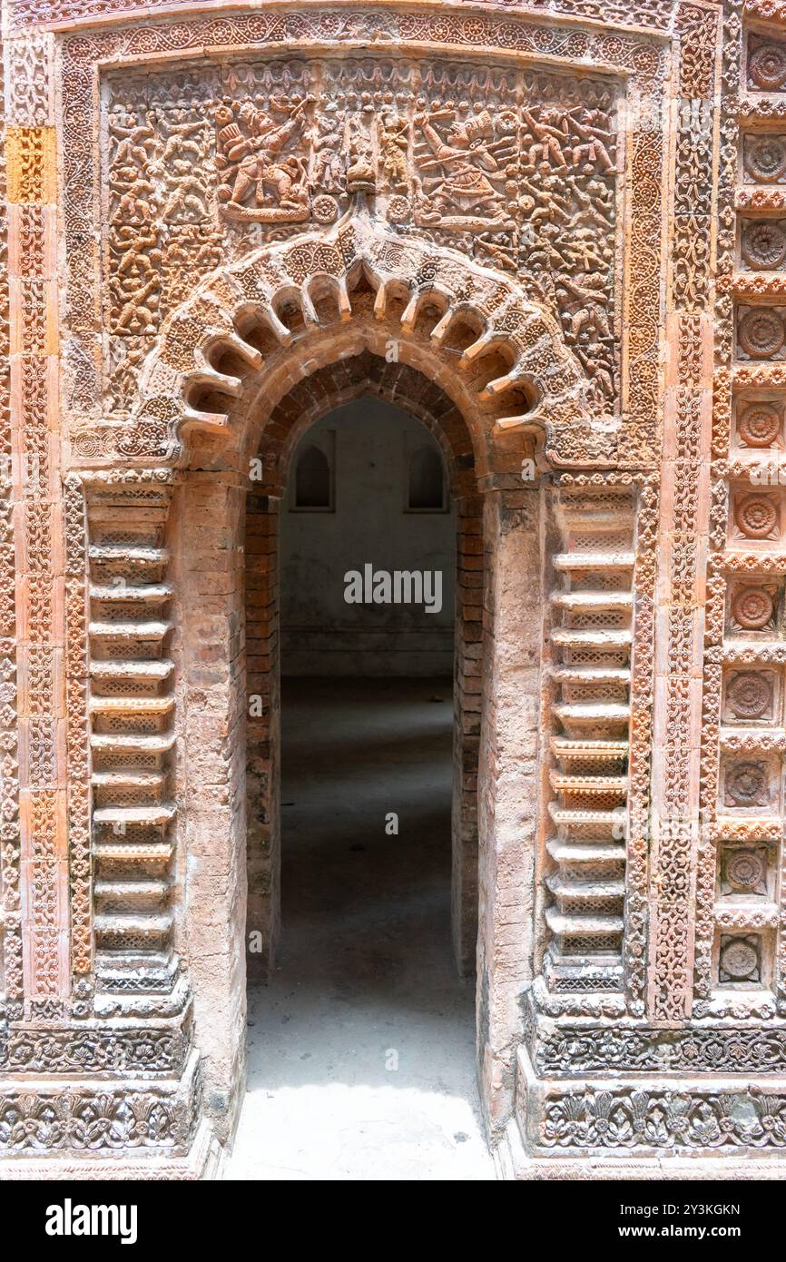 Entrance arch decorated with terracotta carvings in Pancha Ratna ...