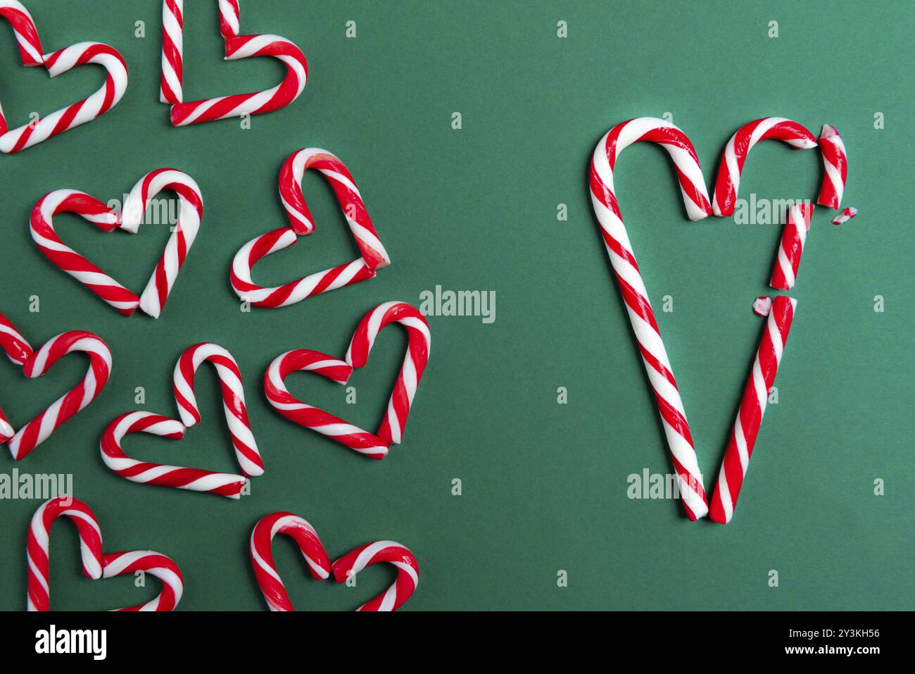 Red and white mini candy canes, arranged in heart shapes, and big candy ...