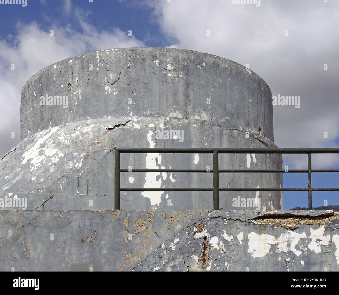 An old crumbling concrete military bunker type structure with rounded ...