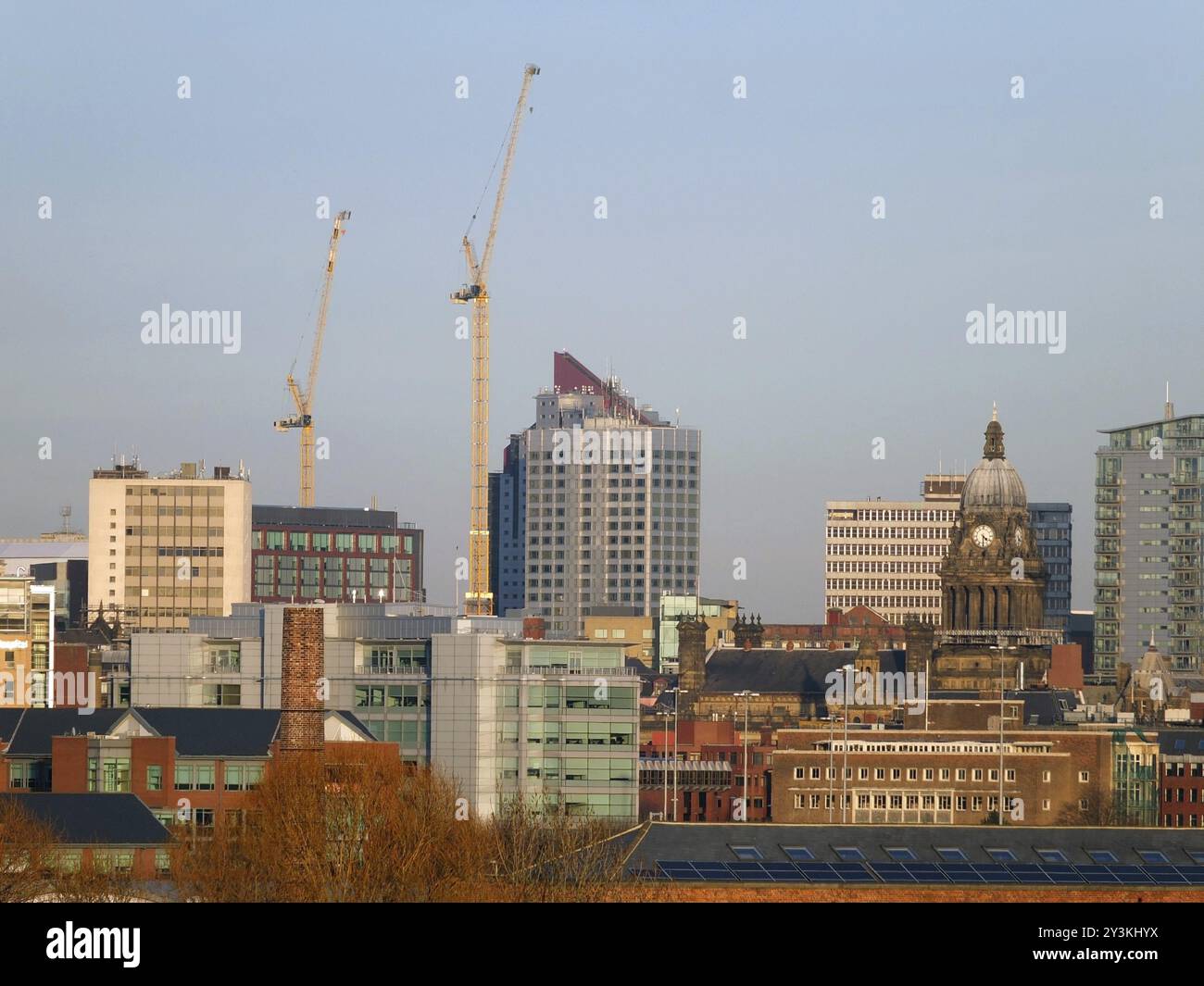 A cityscape view of leeds showing the modern buildings city hall and ...