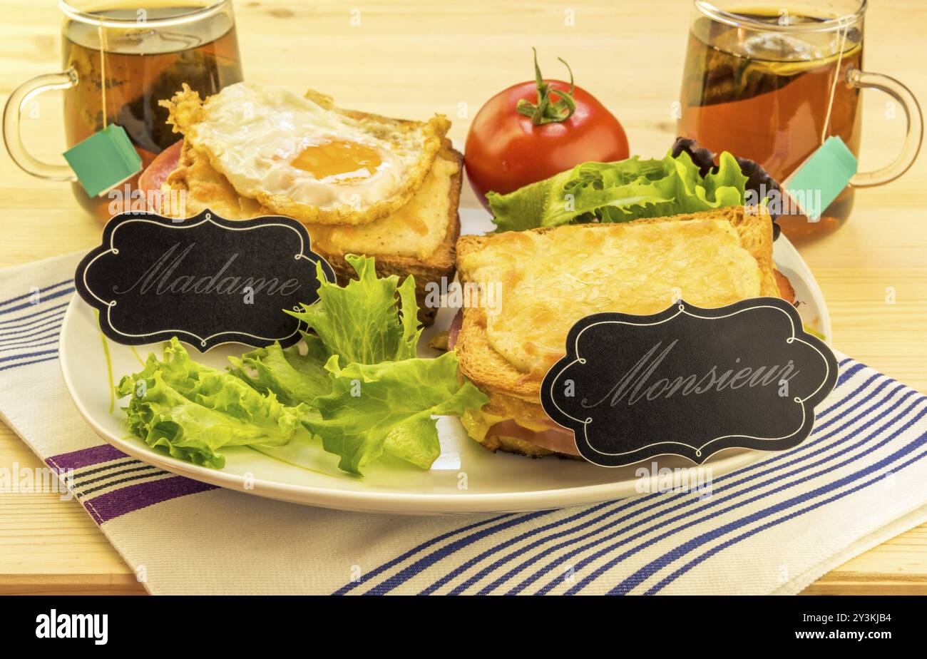 Delicious meal with french sandwiches called croque madame and croque ...