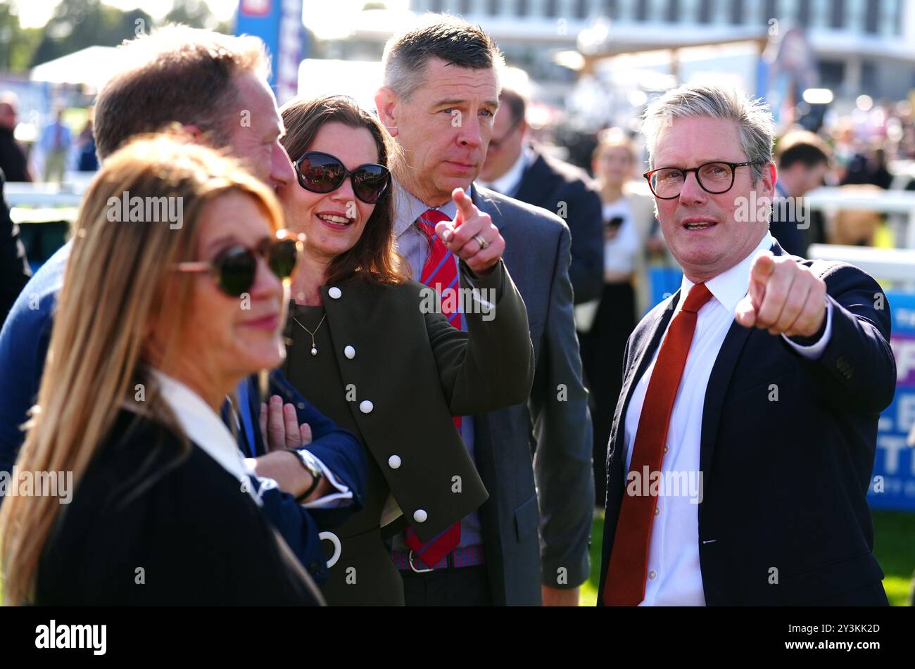 Prime Minister Sir Keir Starmer (right) with his wife Victoria, on day ...