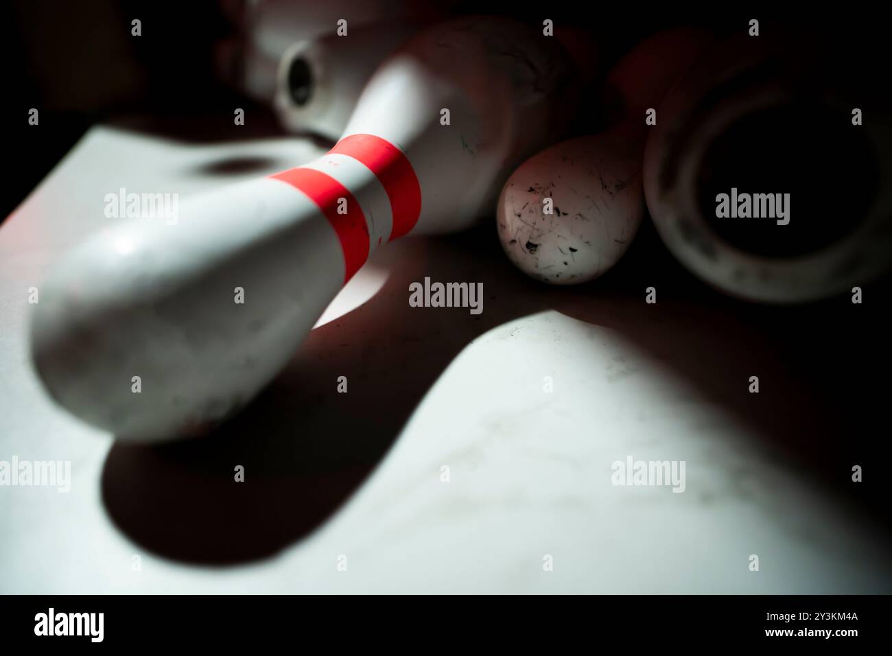Artistic photo of bowling pins. Close up picture, wallpaper. Dark ...