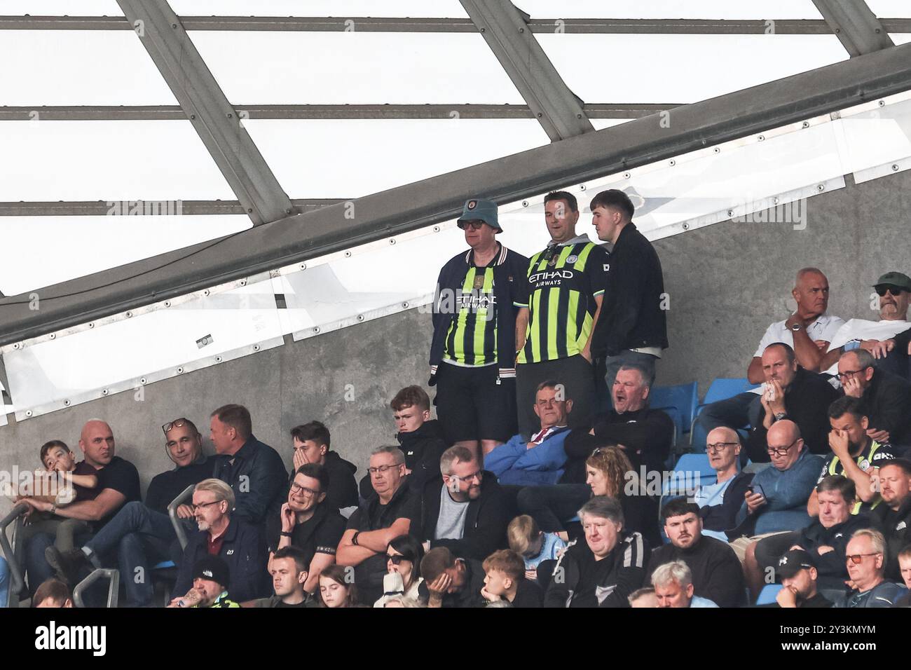 Manchester City fans up in the gods watching the game during the ...