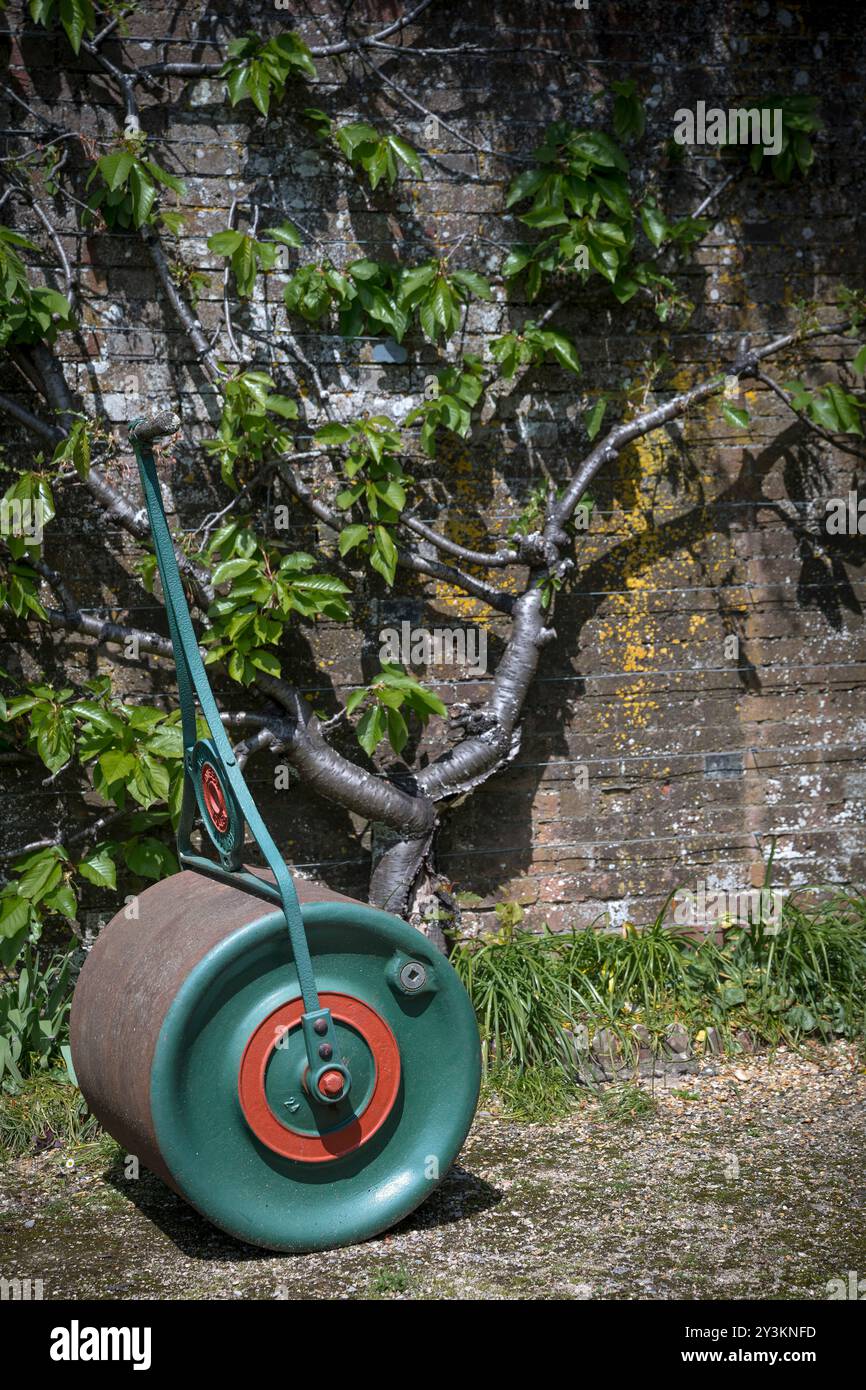 Vintage barrow at garden Stock Photo - Alamy
